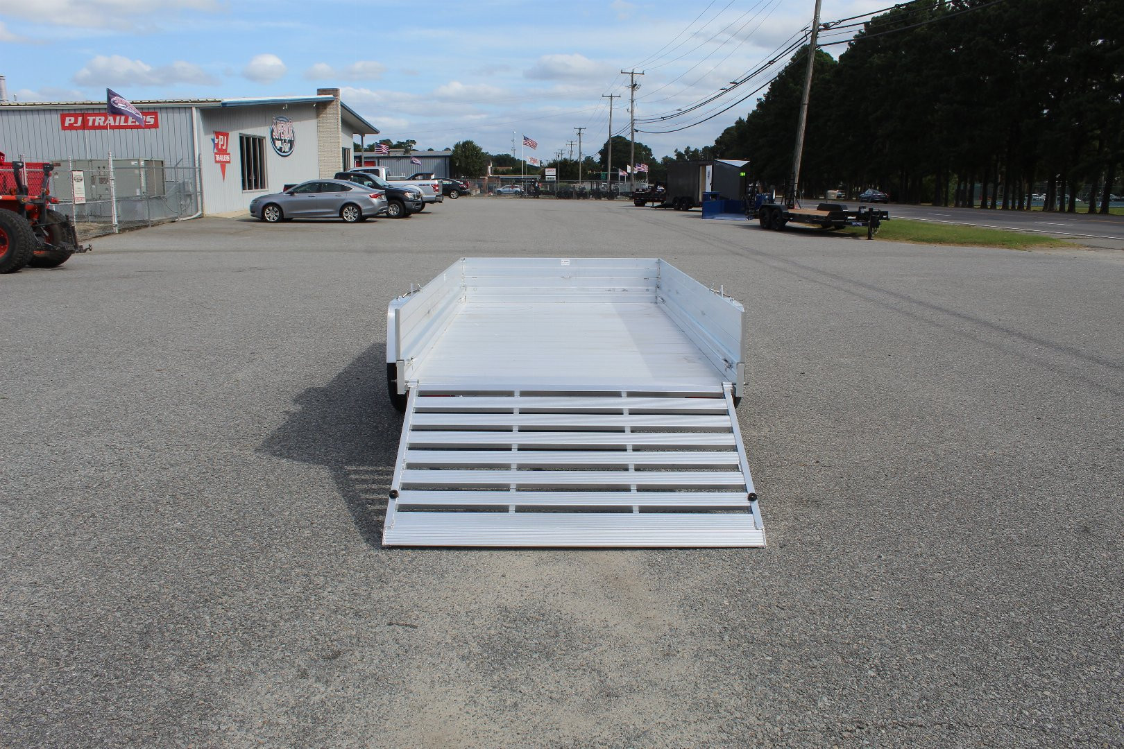 New 2025 ALUMA 6812H w/ 12" Solid Sides & Gate Utility Trailer