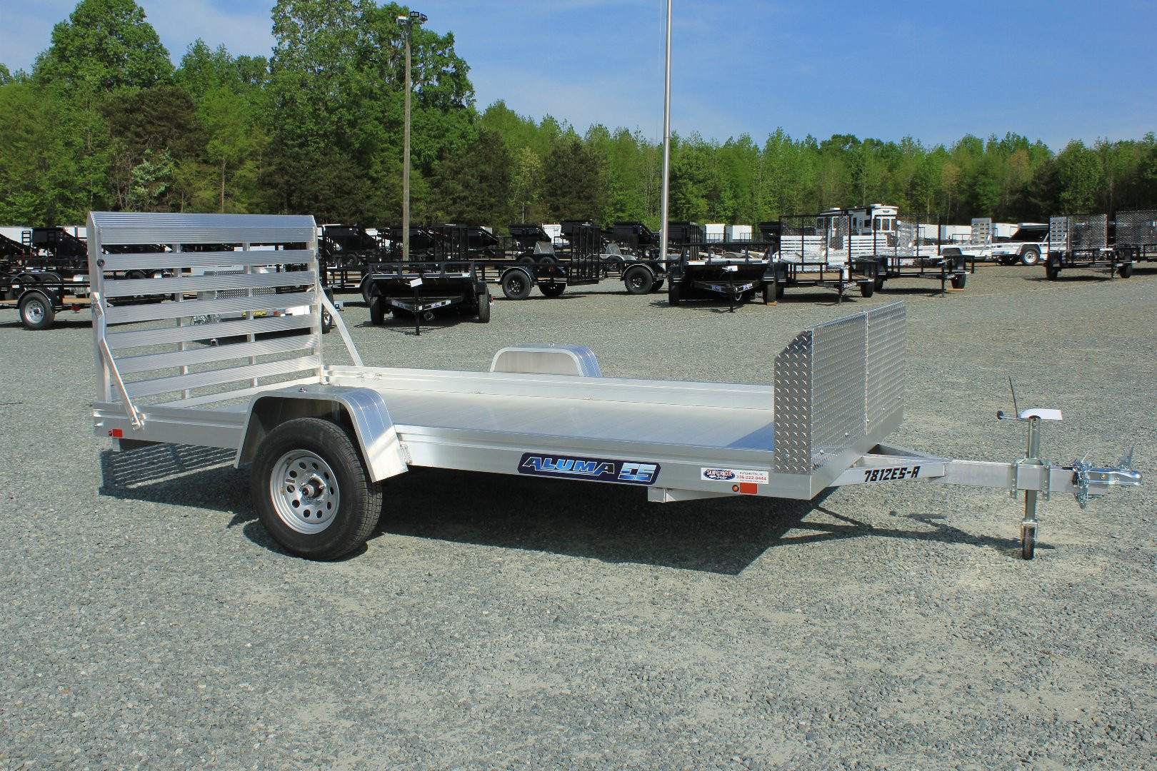 New 2025 ALUMA 7810ES w/Rock Guard & Tailagate Utility Trailer