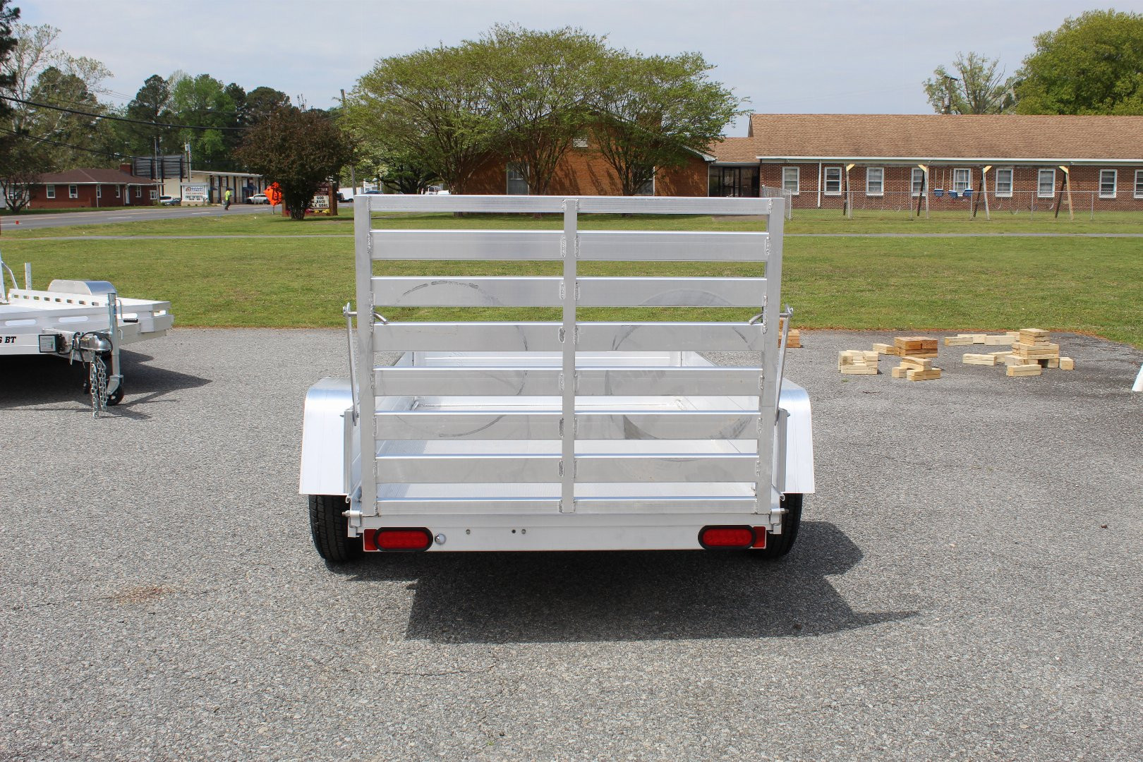 New 2025 ALUMA 548 w/ 12" Solid Sides and Tailgate Utility Trailer