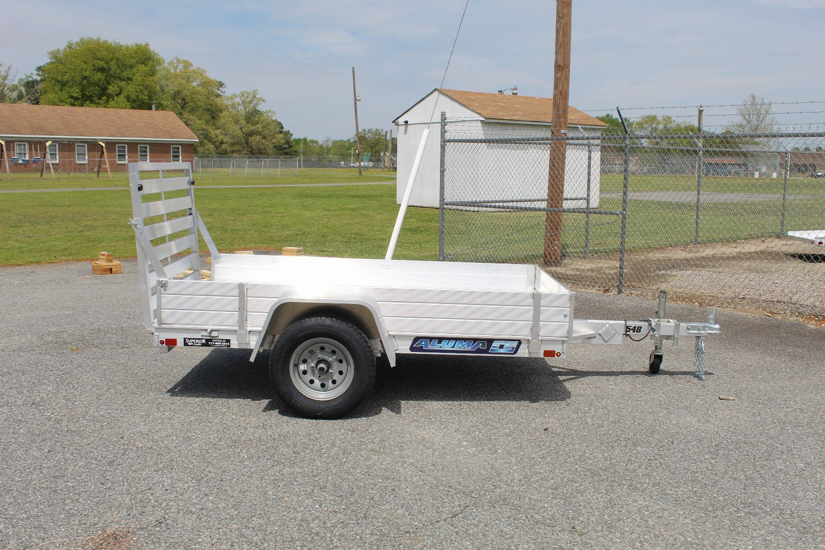 New 2025 ALUMA 548 w/ 12" Solid Sides and Tailgate Utility Trailer