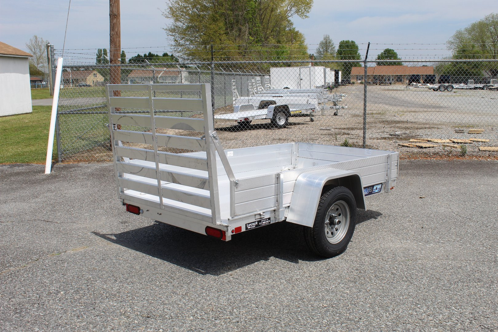 New 2025 ALUMA 548 w/ 12" Solid Sides and Tailgate Utility Trailer