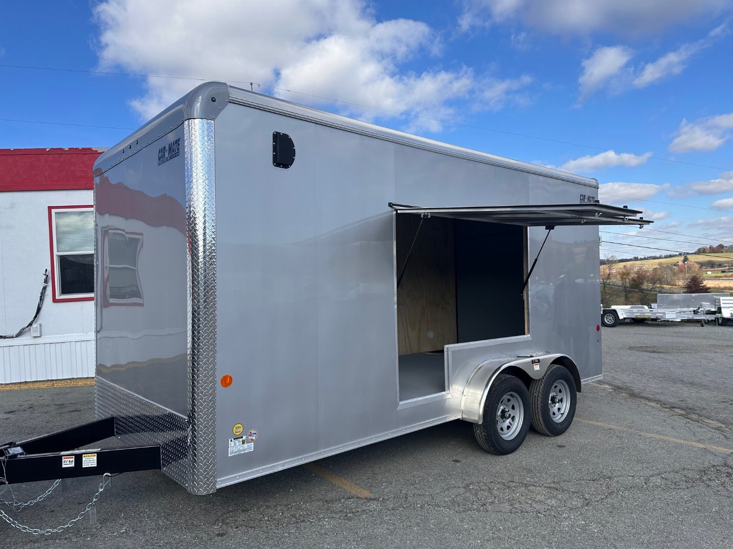 New 2025 Car Mate 7x16 HD Custom Cargo Trailer w/ Step-Out Awning Door