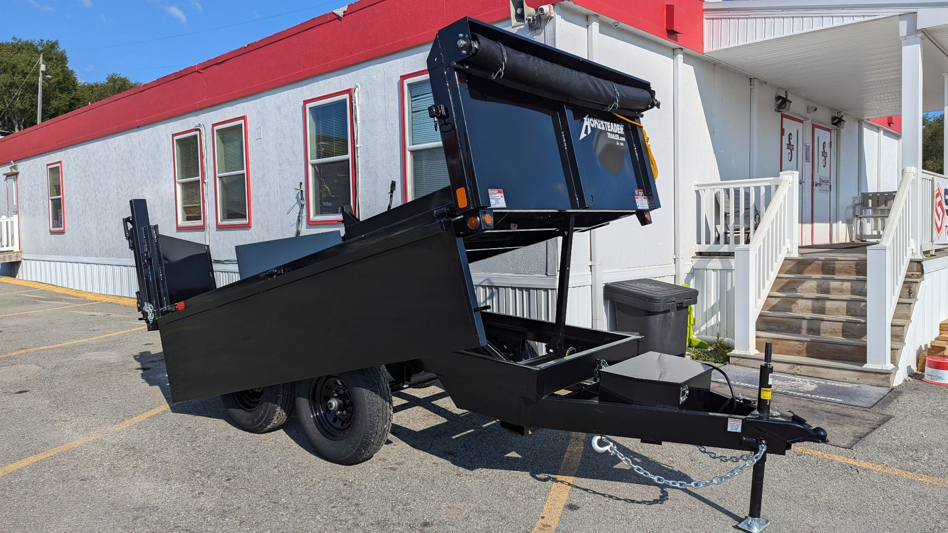 New 2025 Homesteader 6x12 Deckover Dump Trailer w/ Dropside on Curbside & Barn/Spreader Gate