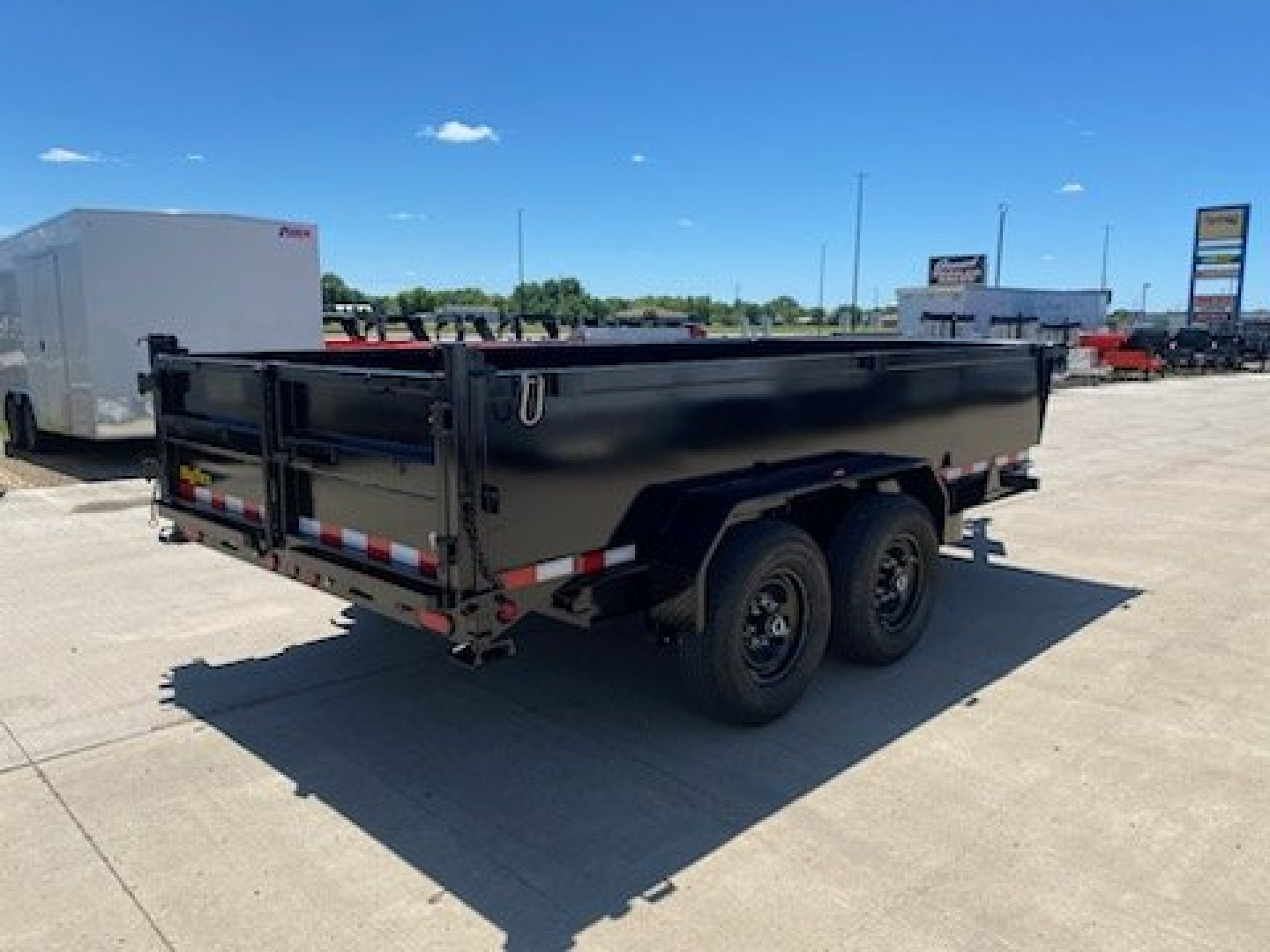 New 2025 Big Tex Trailers 14LX-14C2A-BK Dump Trailer