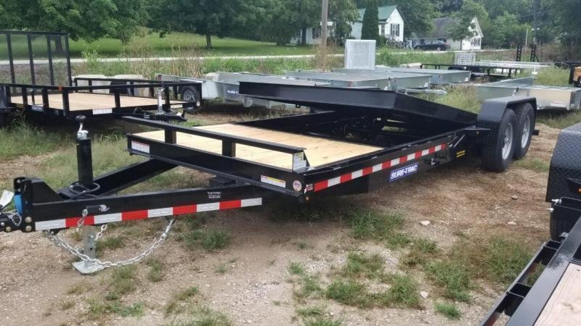 New 2025 Sure-Trac 7x18+4 Tilt Deck Equipment Trailer w/Stationary 14k