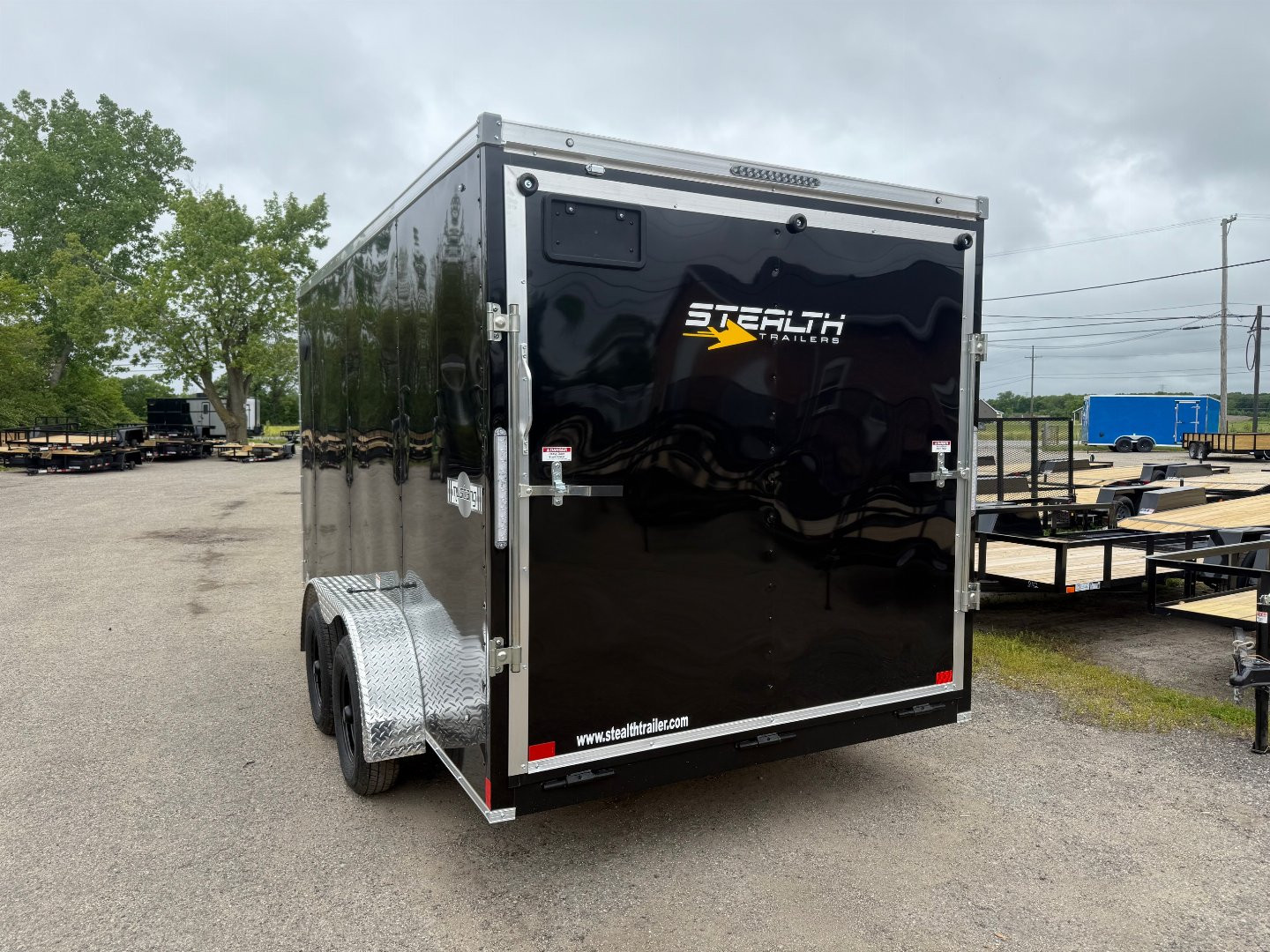 New 2025 Stealth 7 X 14 Cargo / Enclosed Trailer with Ramp Door and 6ft ...