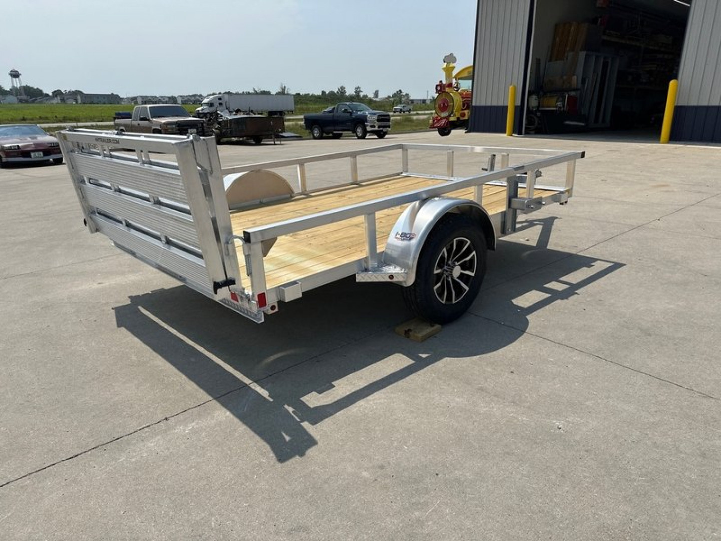 New 2025 H&H Aluminum 76"x10' 3k Rail Side Utility Trailer