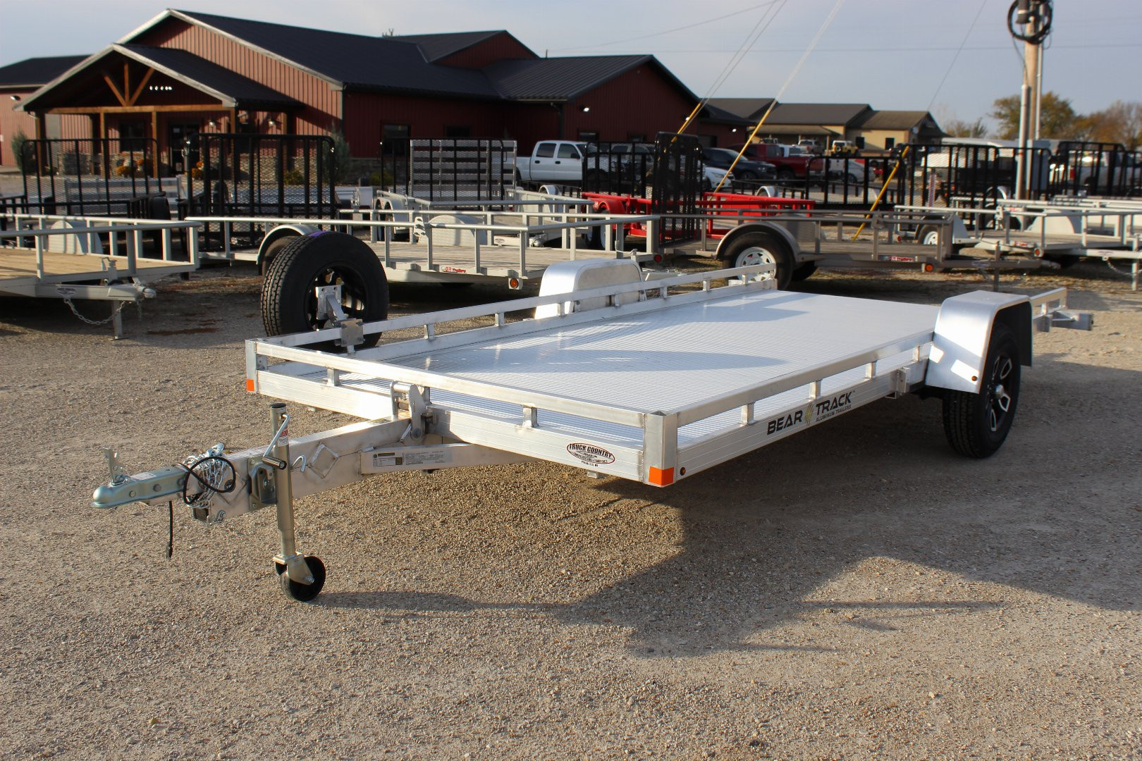 New 2025 BEAR TRACK 15' Aluminum Tilt Utility Trailer