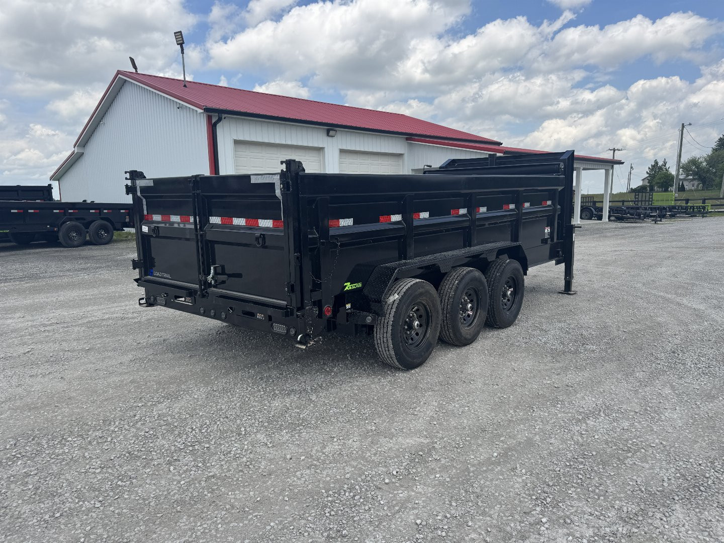 New 2025 LOAD TRAIL 83"x16' 21,000# 3' Side Telescopic Lift Dump Trailer