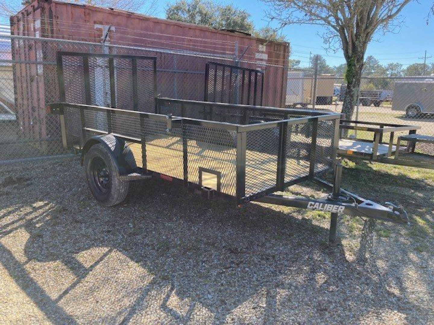New 2025 Caliber Trailer Mfg 5x10 SA AG510 2' mesh sides Utility Trailer