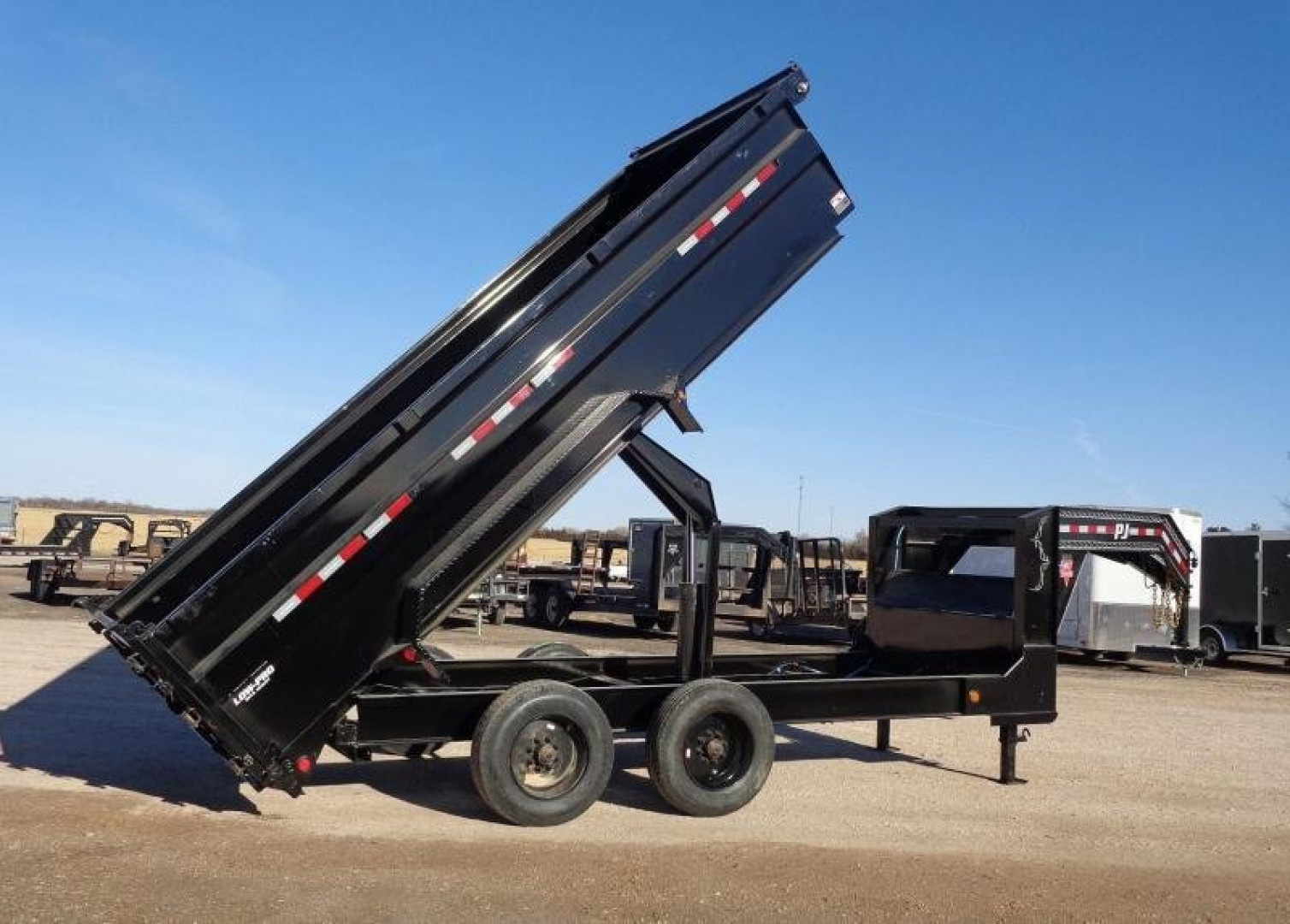 New 2026 PJ Trailers 16' HD Low-Pro (DE) Dump Trailer for sale in St John, KS