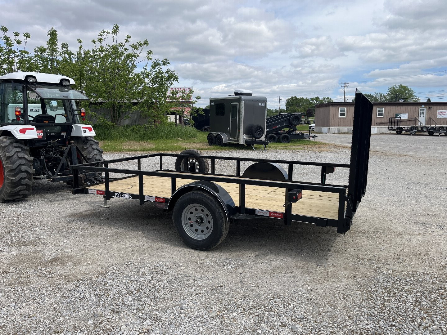 New 2025 Quality Trailers 77X12SA Utility Trailer Pro