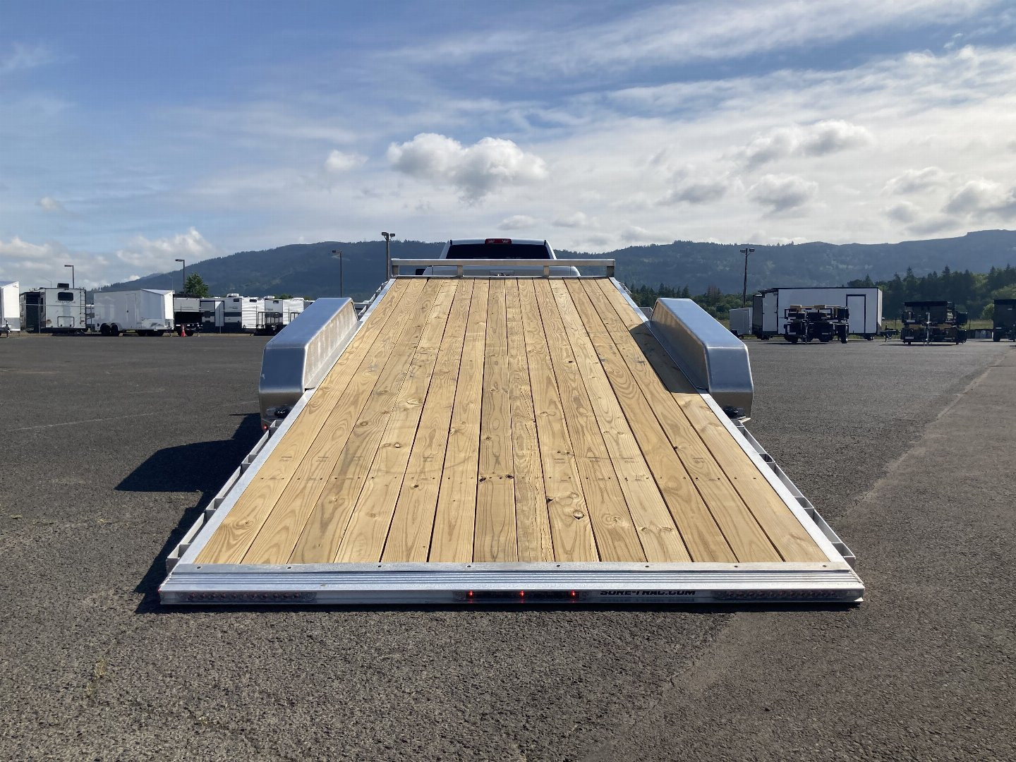 New 2025 Sure-Trac 7'X20' (7K GVWR) Aluminum Open Power Tilt Car Hauler