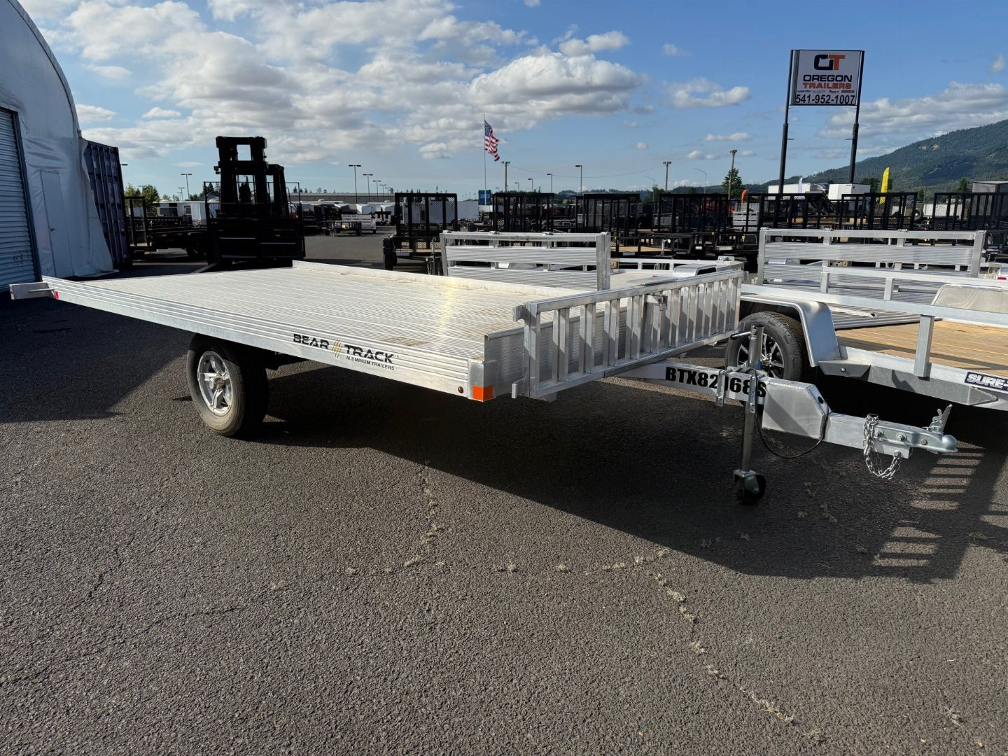 Used 2025 Bear Track BTX82168S Open Aluminum Deckover Trailer