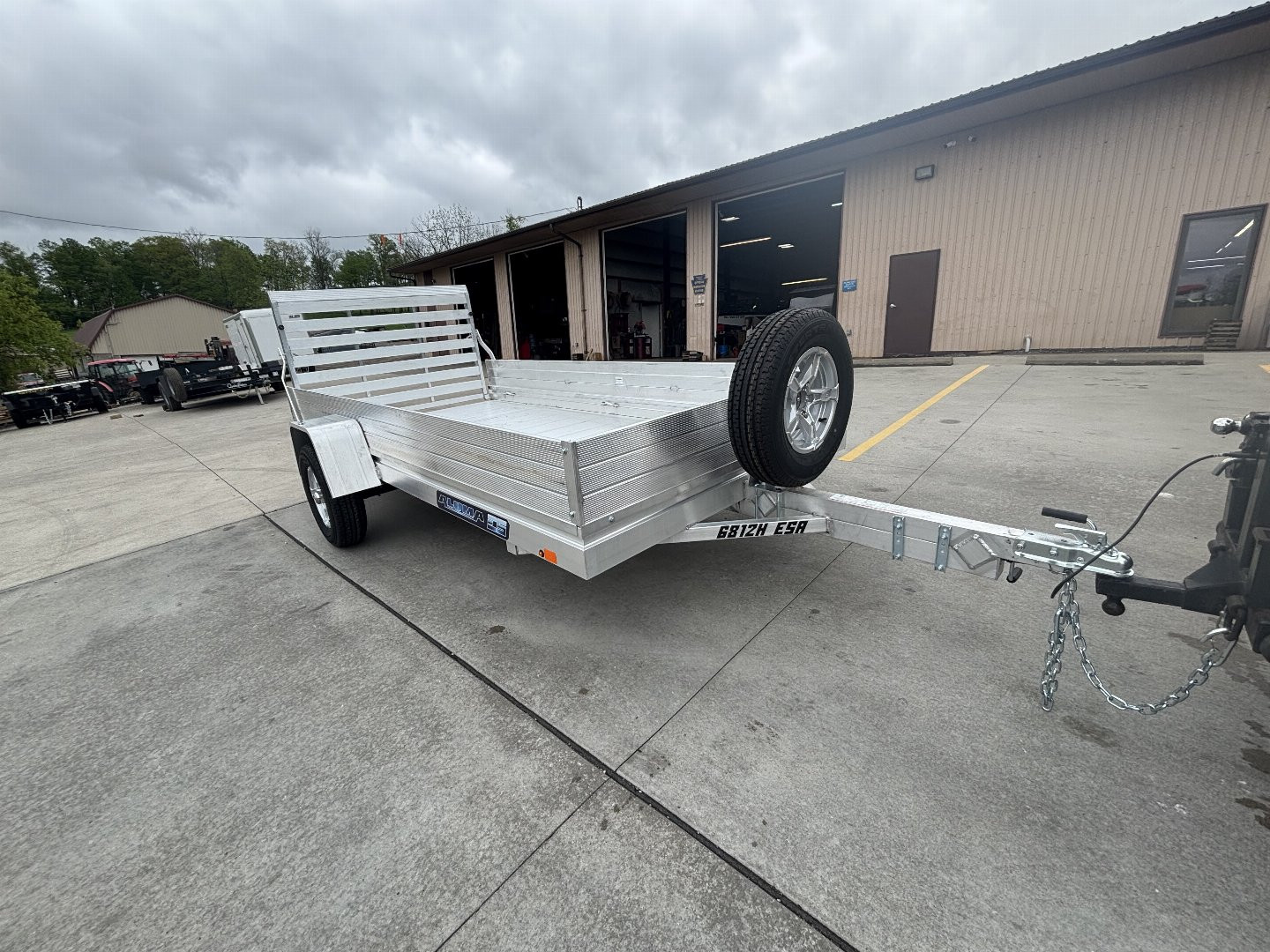New 2026 Aluma Trailers 6812H-ESA Aluminum Utility Trailer w/ 12" Side ...