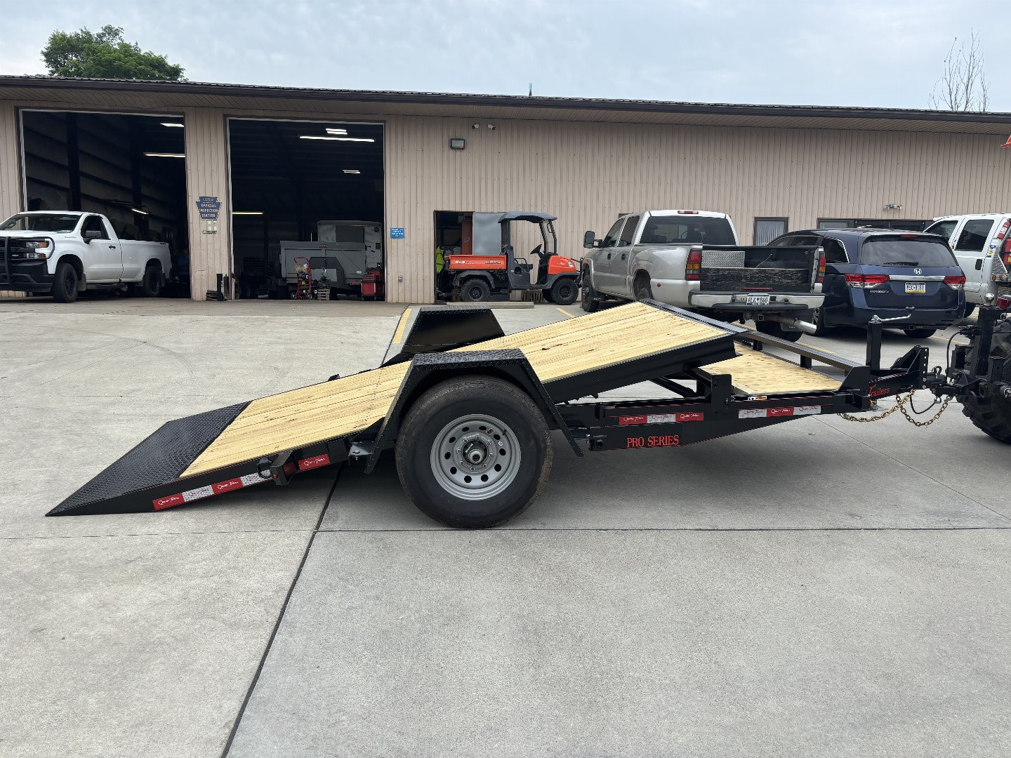New 2026 Quality Trailers 14' EQUIPMENT WOOD DECK TILT DECK - 7000# GVWR