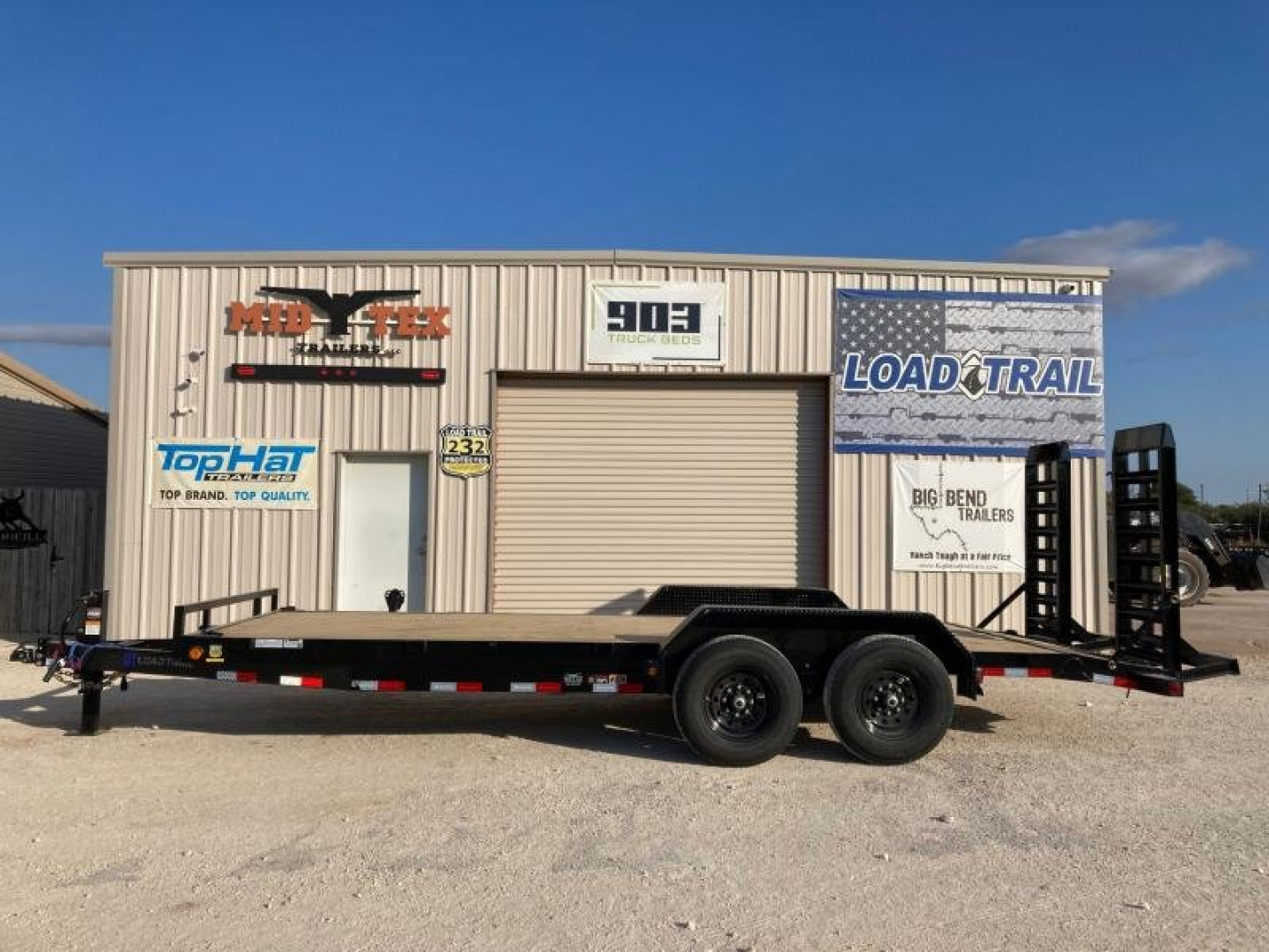 New 2025 LOAD TRAIL 83" X 20' TANDEM AXLE CARHAULER