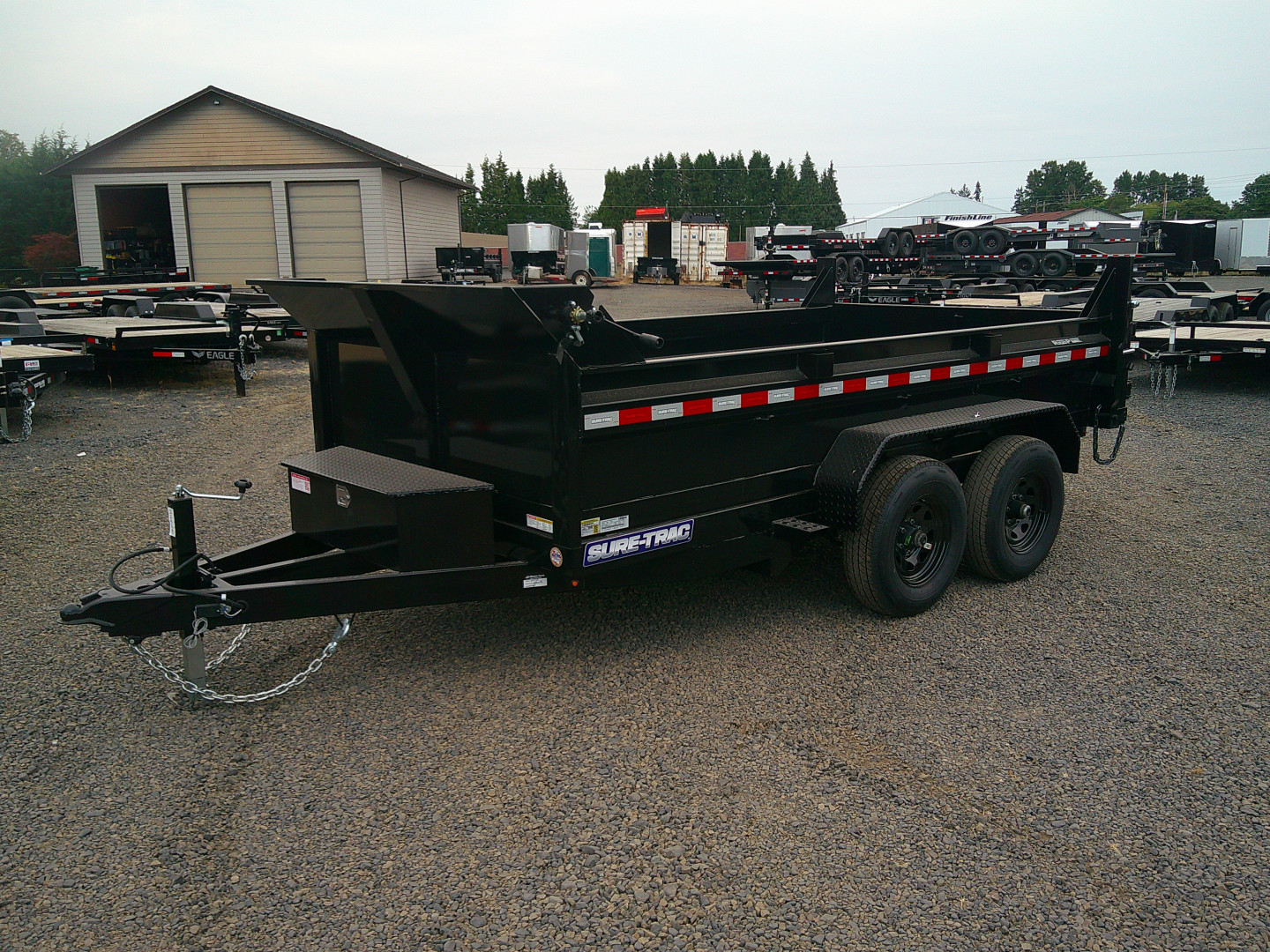 New 2025 Sure-Trac 6x10 SD Low Profile 10K Dump Trailer