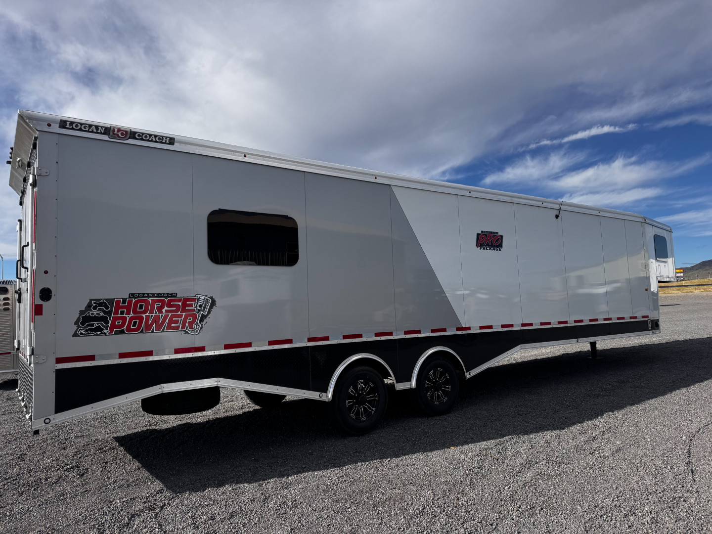 New 2025 Logan Coach 33' Horsepower Pro Package ATV Trailer