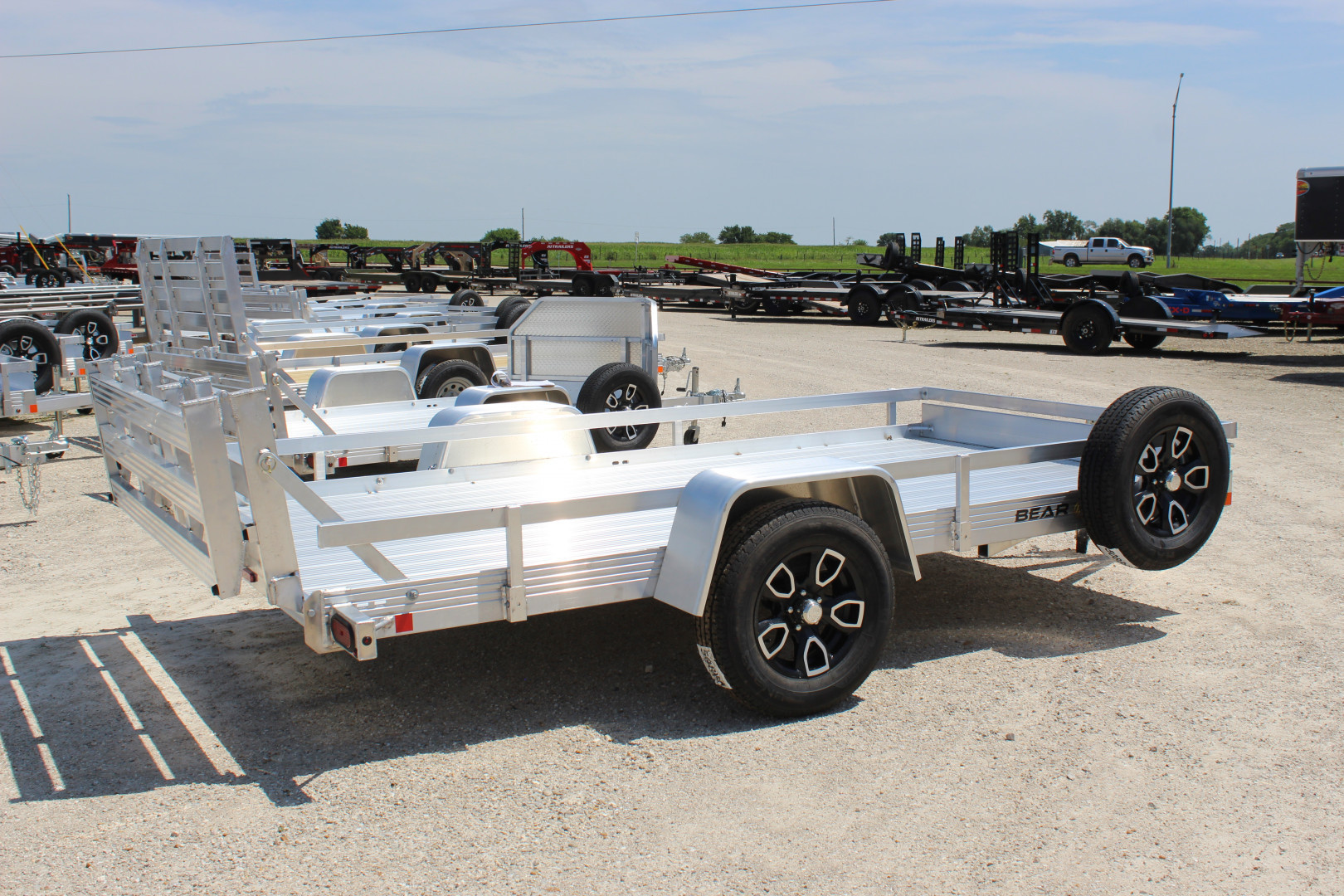 New 2025 Bear Track 76x12 Aluminum Utility Trailer