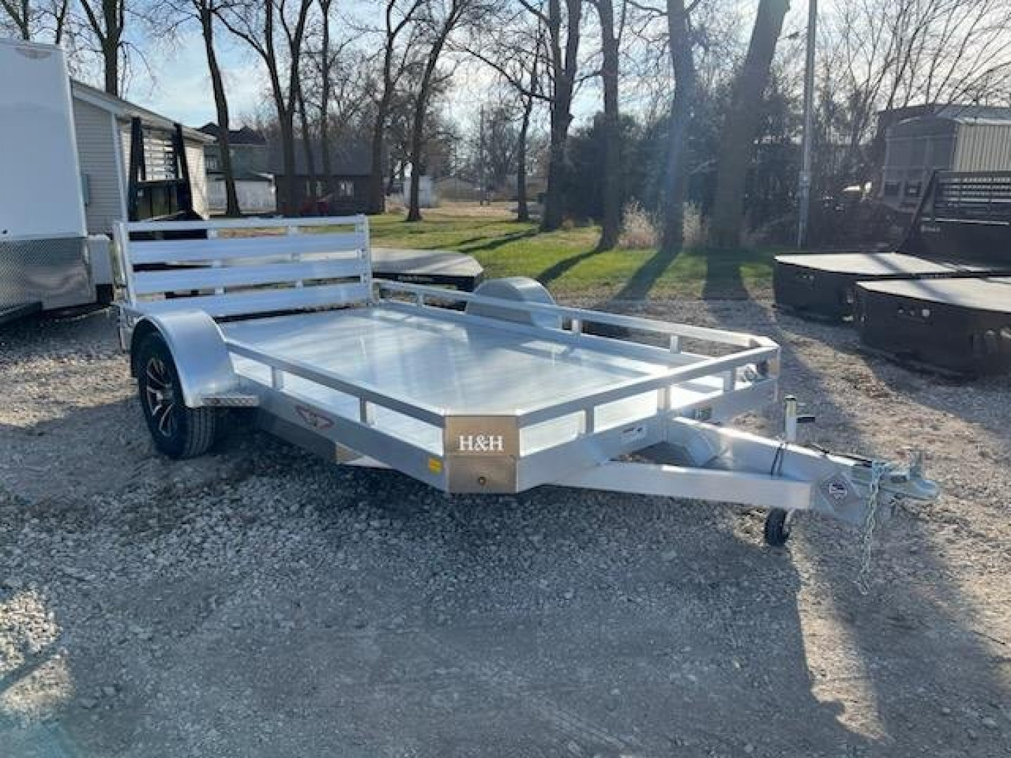 New 2026 H&H Trailers 76x10 Rail Side 3K Utility Trailer