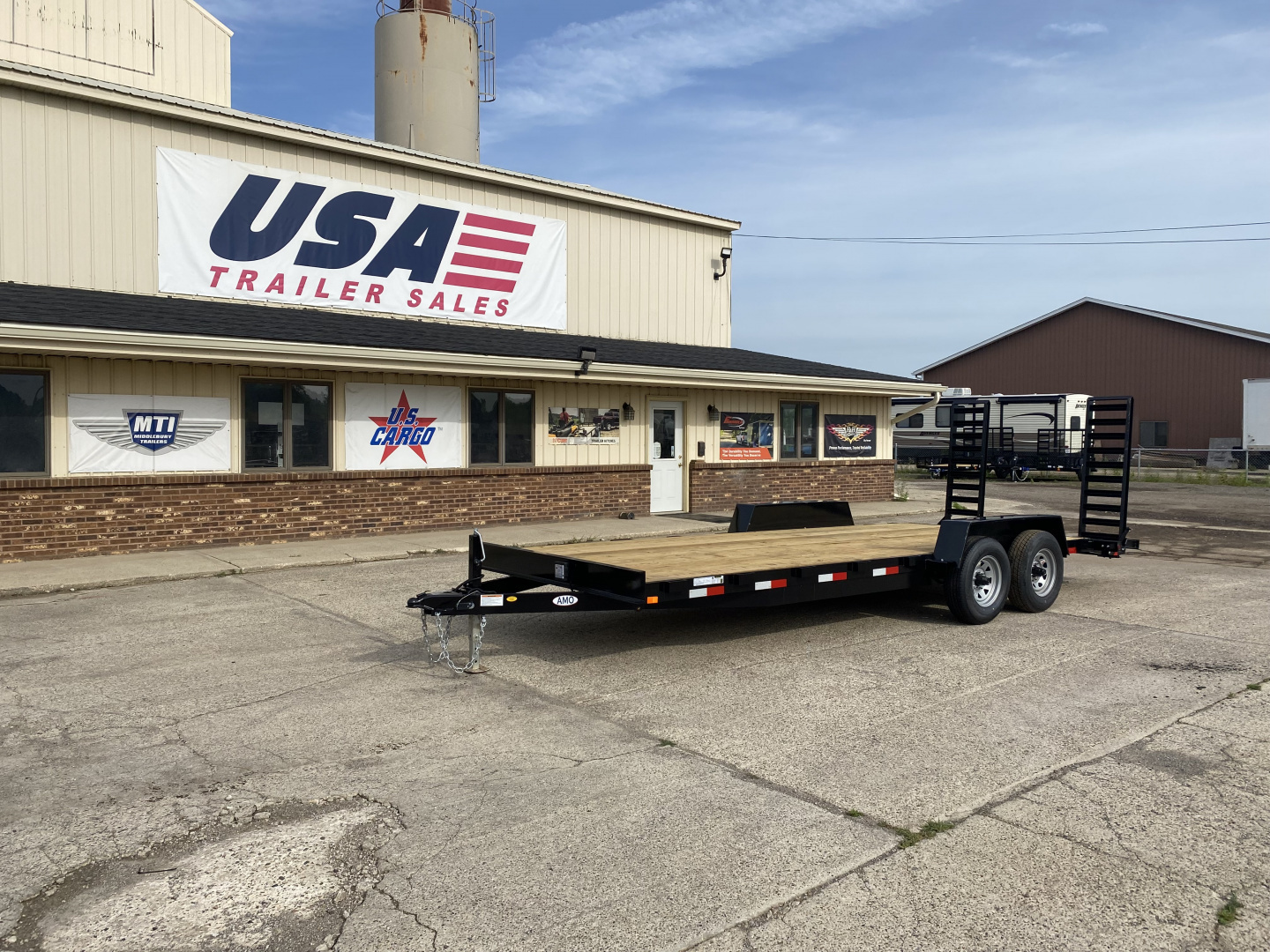 New 2026 AMO 82x20 Skidsteer 10k Equipment Trailer for sale in Wayland, MI