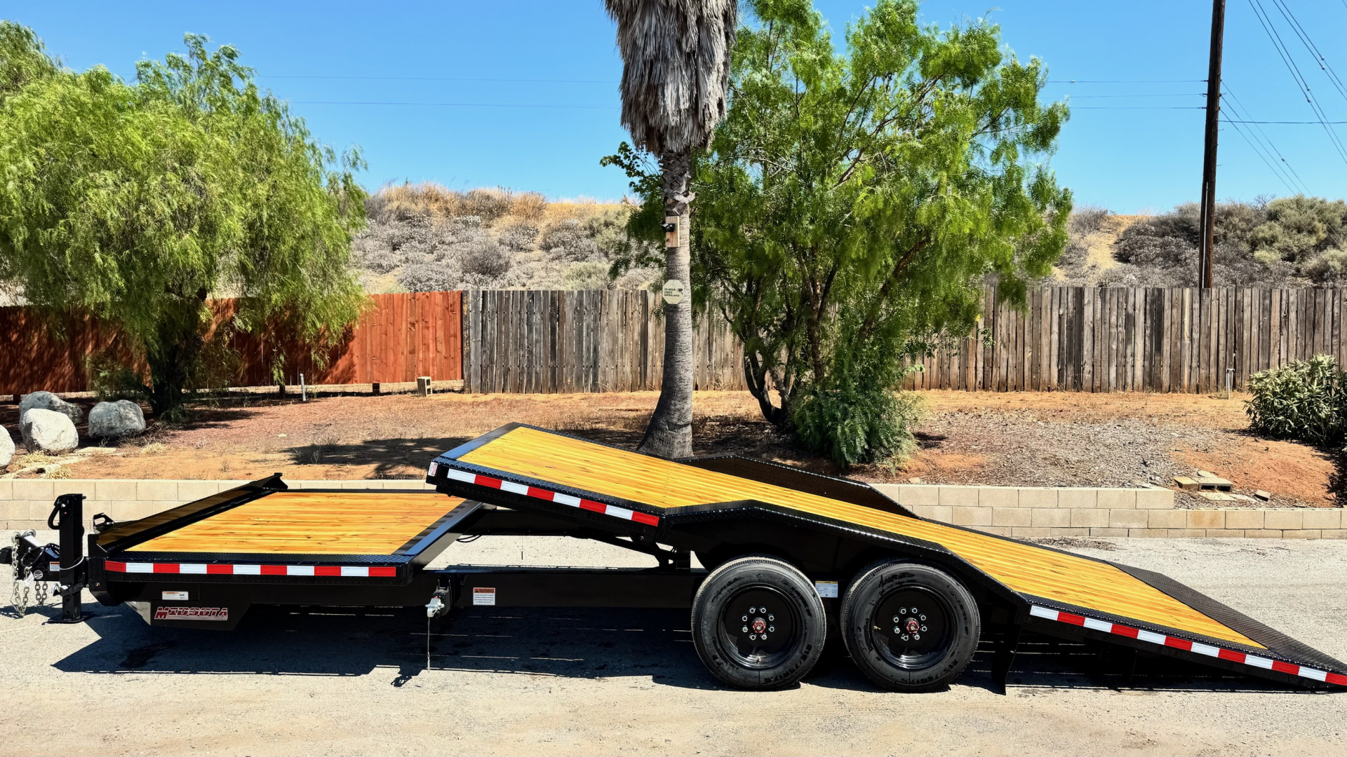 New 8.5x24 Tandem Axle 17.6K Drive Over Tilt Trailer