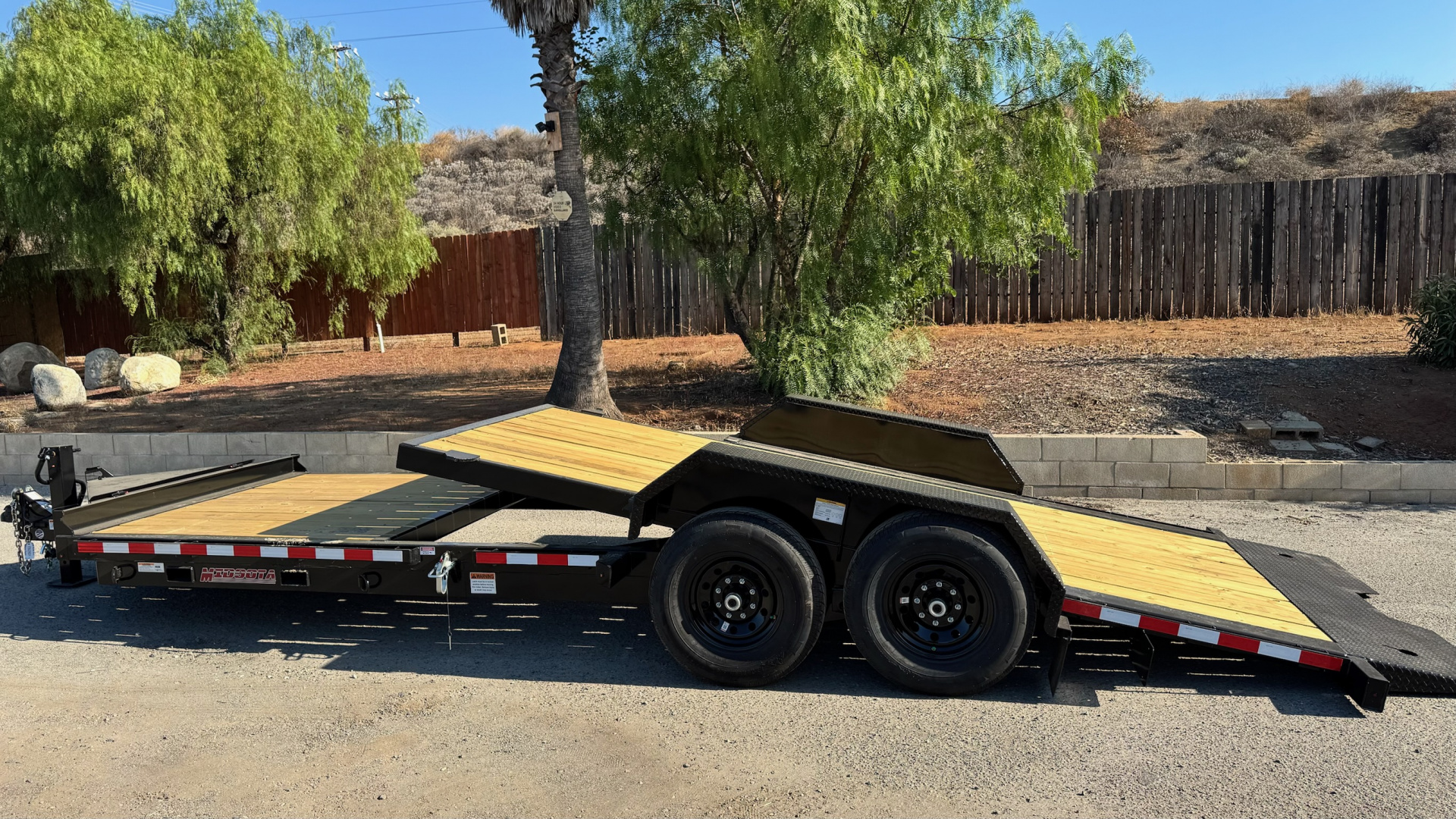 New 8.5x24 Tandem Axle 17.6K Drive Over Tilt Trailer