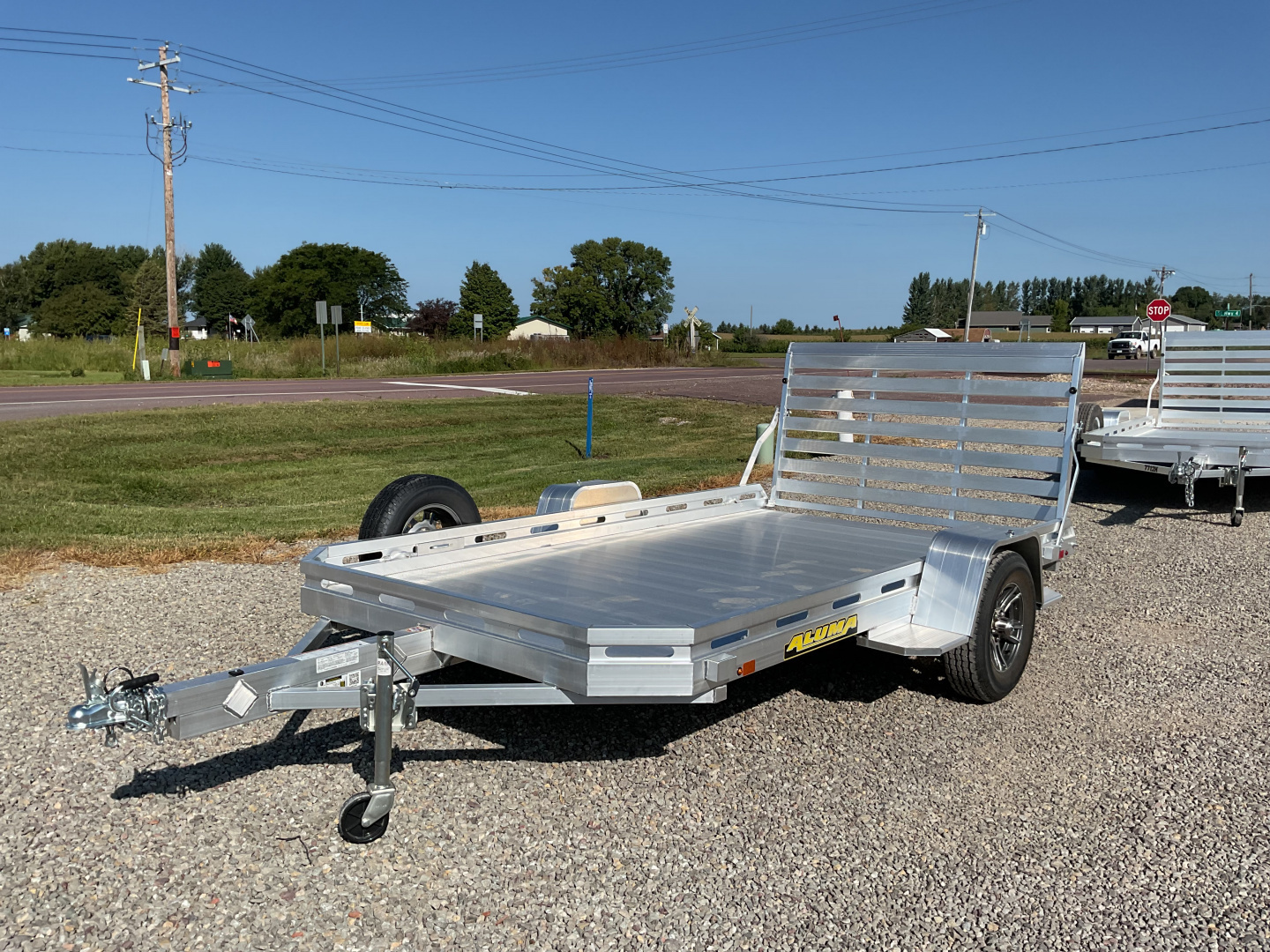 New 2026 Aluma 7712H-STG Utility Trailer for sale in Sherburn, MN
